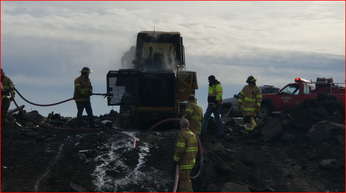 Loader damaged in fire at BASWA construction rubble site - SOUTHEAST ...